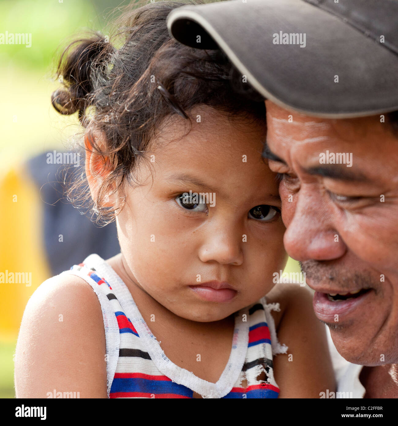 Portrait of a young Filipino girl with her father Stock Photo - Alamy