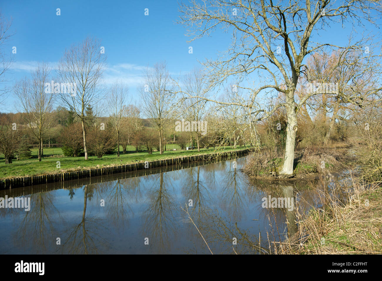 The River Rye flowing between Upper and Lower Slaughter, the Cotswolds ...