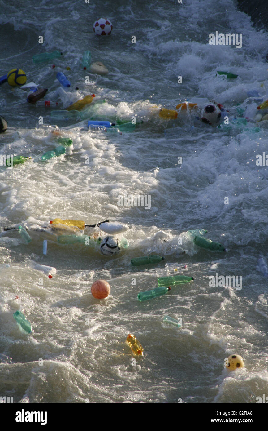 rubbish floating in river waterfall Stock Photo - Alamy