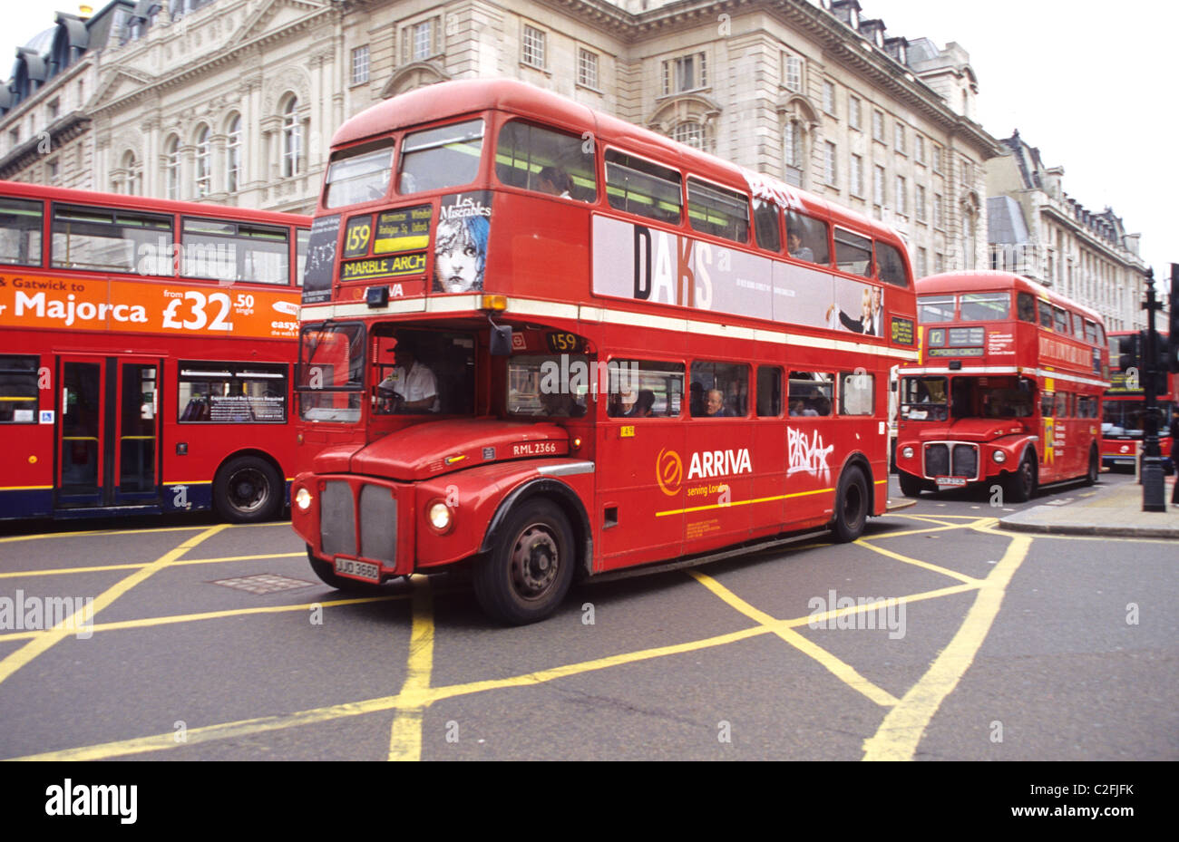 London buses at Piccadilly Circus Stock Photo - Alamy