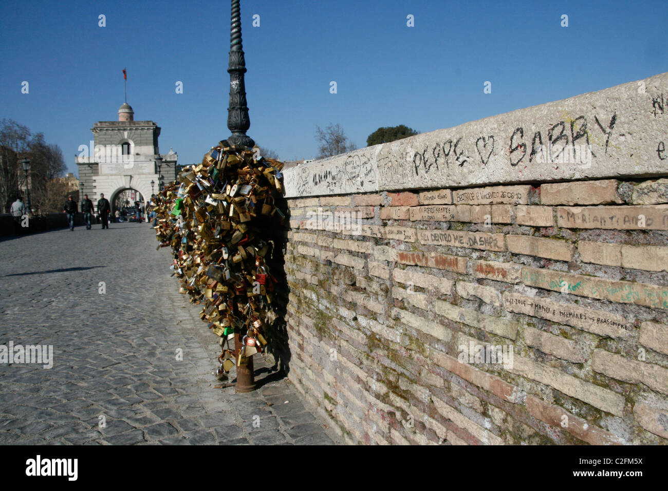 love locks on the milvio bridge in rome, italy Stock Photo - Alamy
