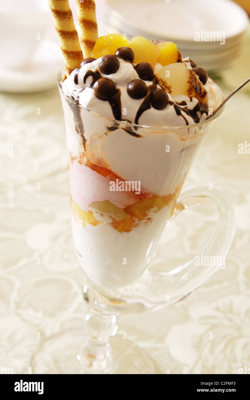 vanilla sundae with whipped cream Stock Photo - Alamy