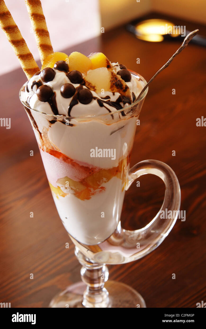 vanilla sundae with whipped cream Stock Photo - Alamy