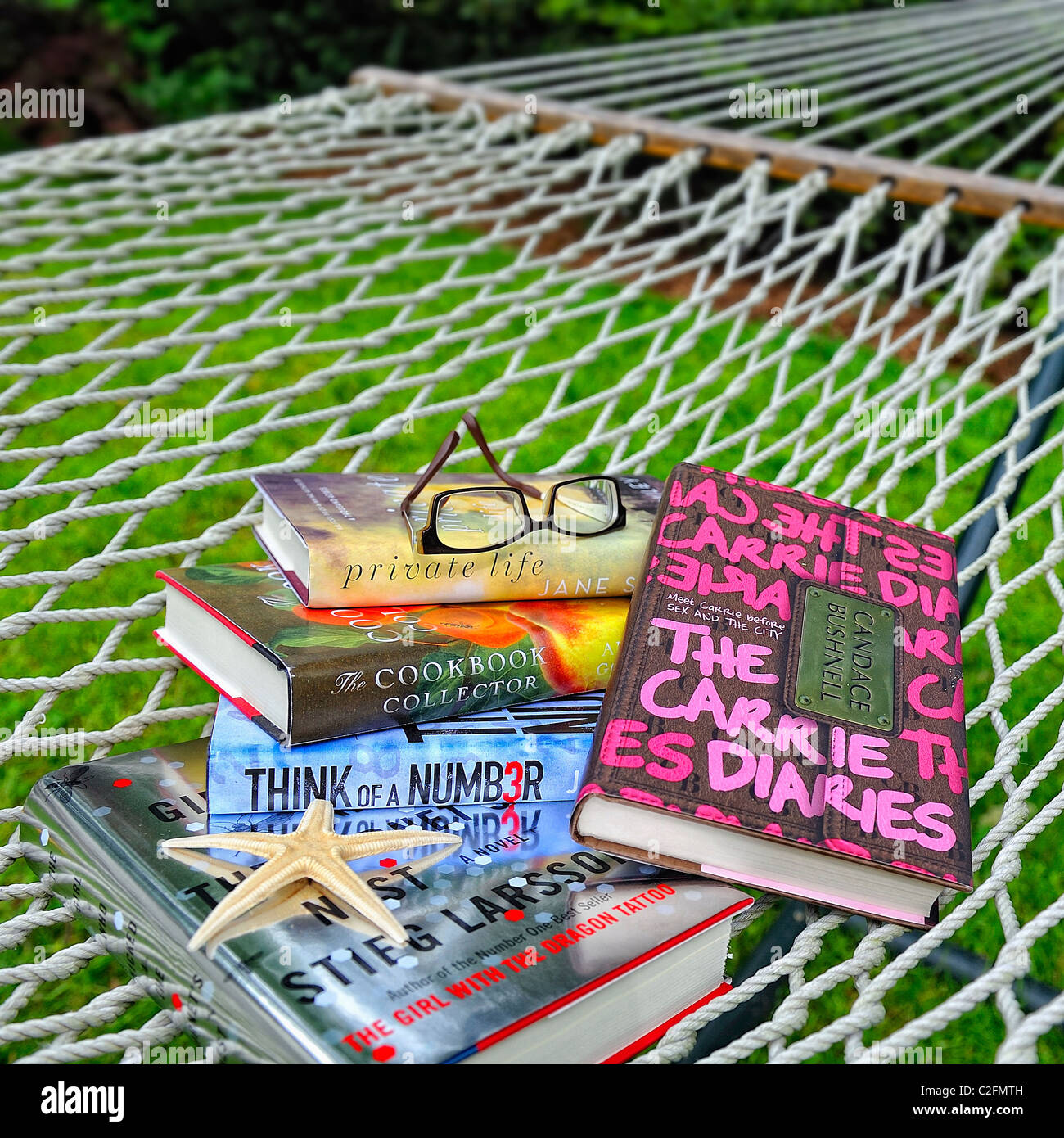 Stack of books best sellers by Stieg Larsson Candace Bushnell Jane ...