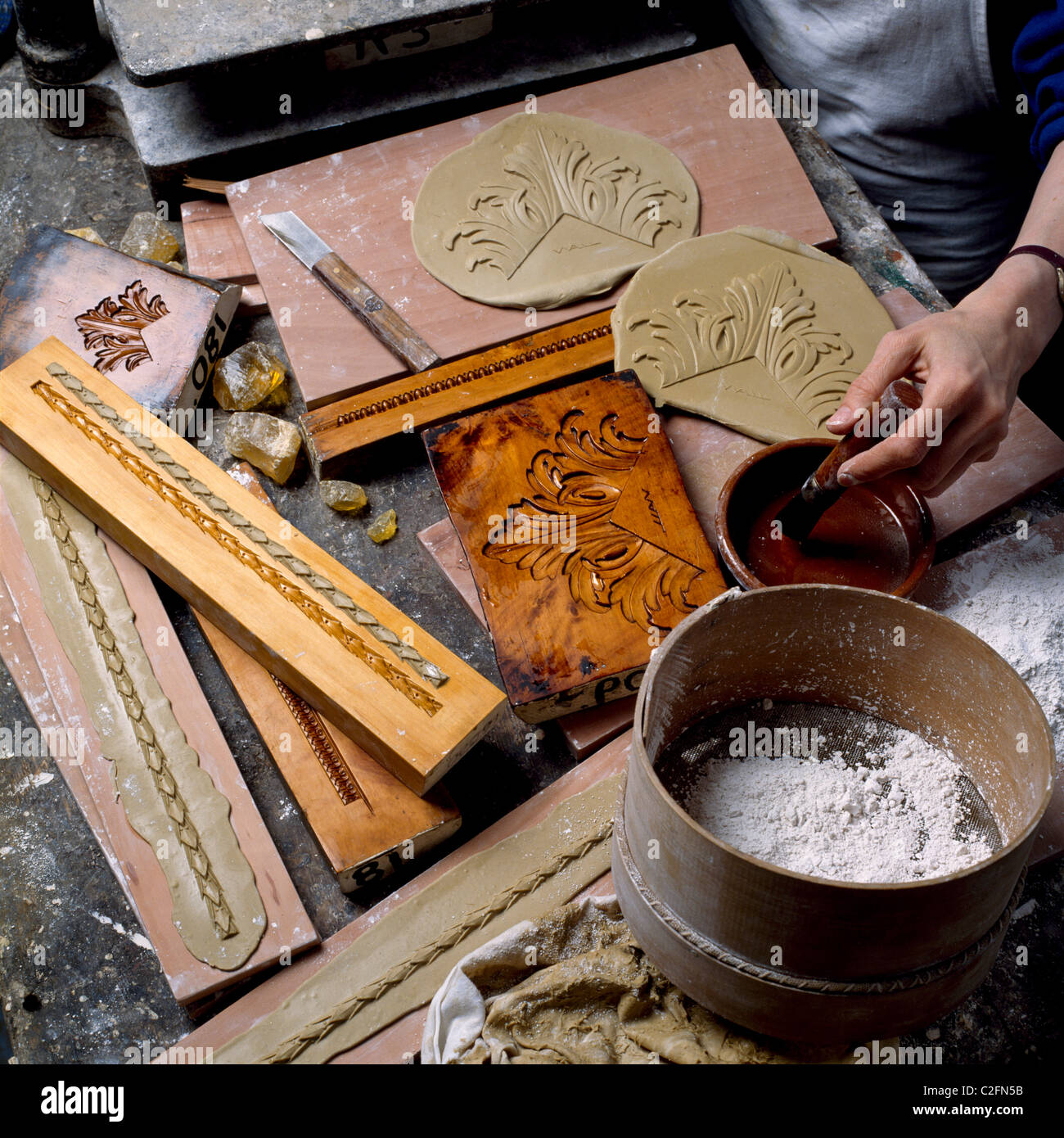 Making Composition mouldings in Arnold Wiggins workshop during picture ...