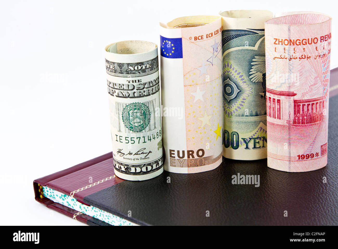 Four currencies hi-res stock photography and images - Alamy
