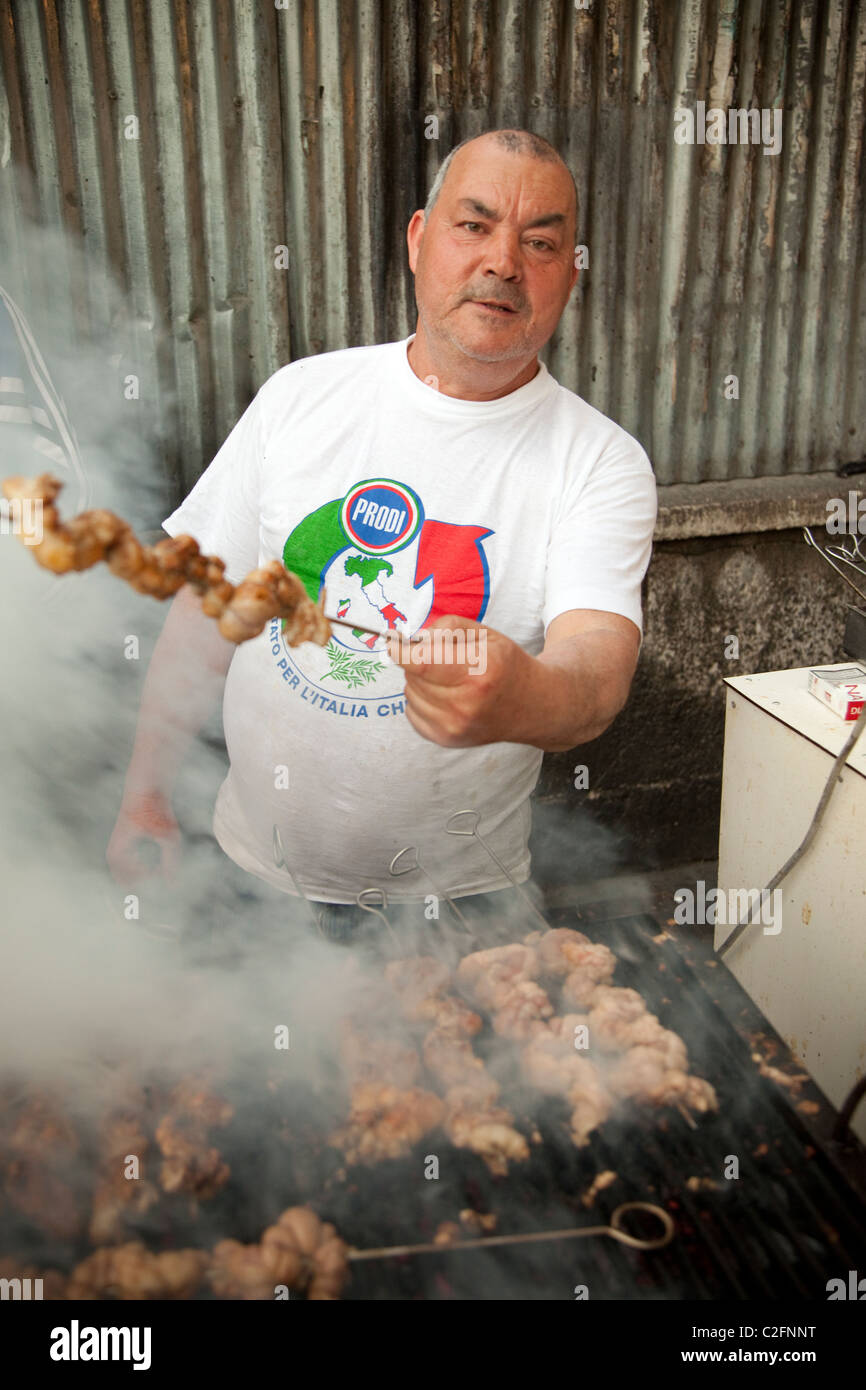 Stigghiola being cooked by the side of the road in Palermo Sicily Stock ...