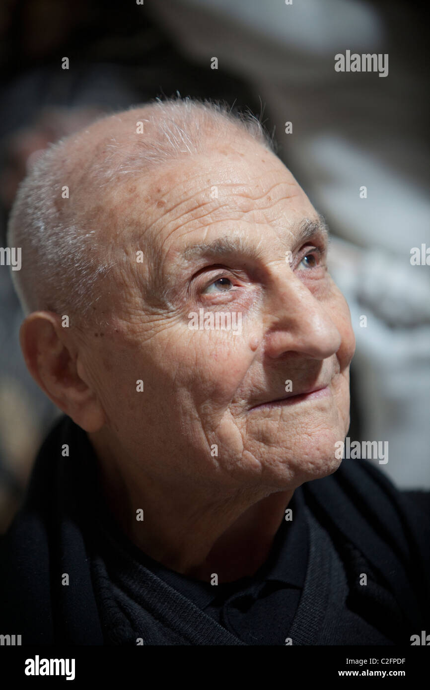 An old man looks up a the art work in Jesus church, Palermo, Sicily ...