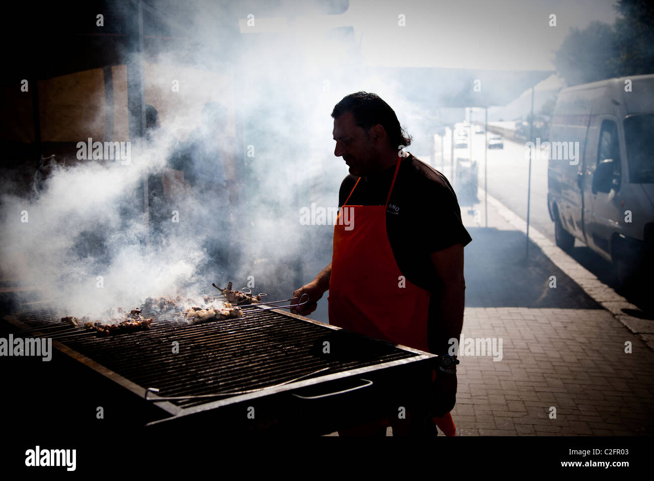 Stigghiola being cooked by the side of the road in Palermo Sicily Stock ...