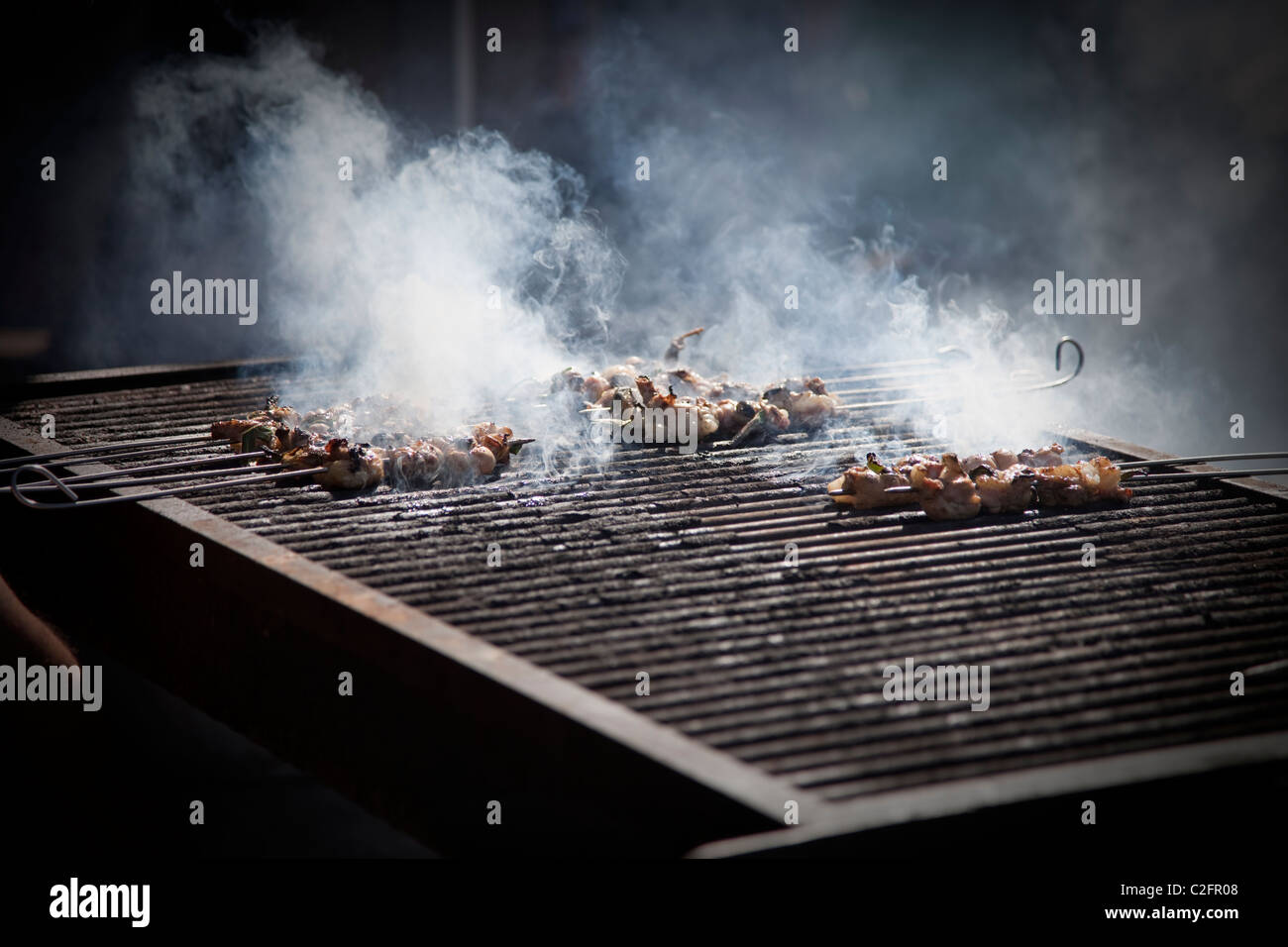 Stigghiola being cooked by the side of the road in Palermo Sicily Stock ...