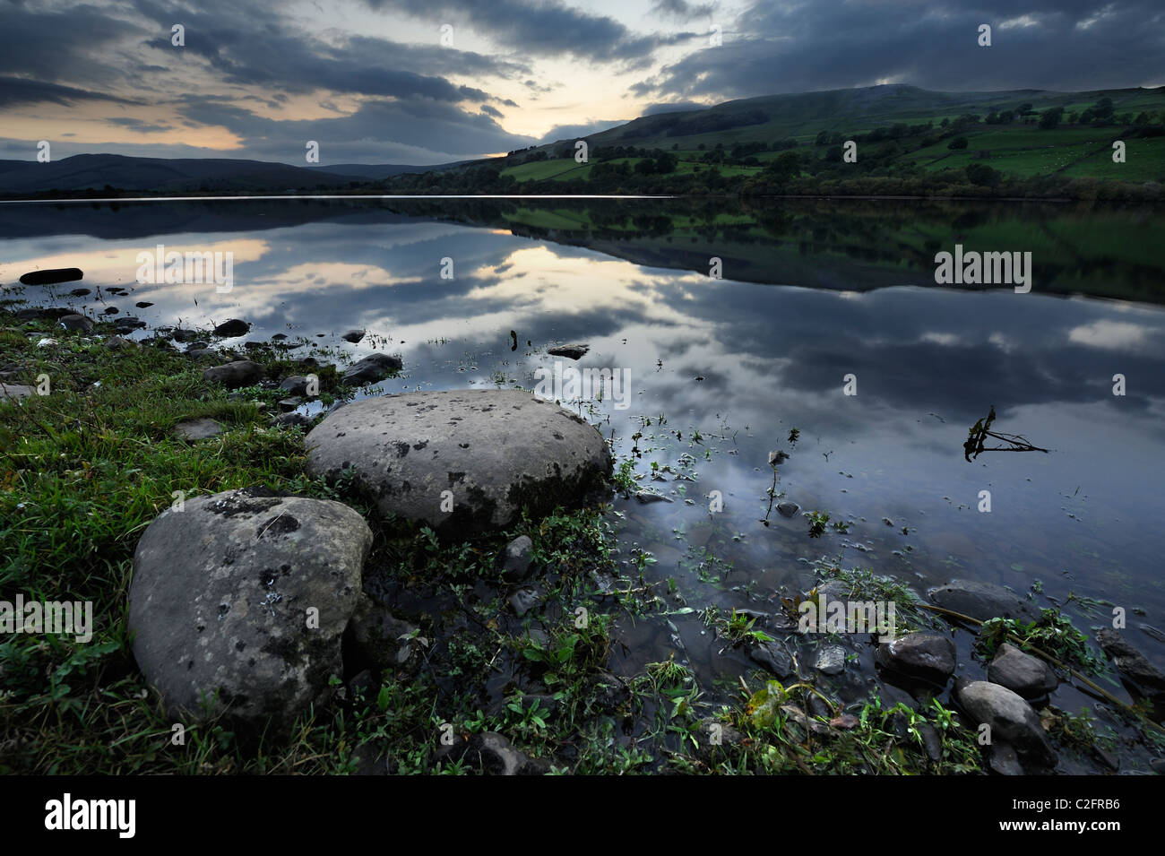 A cool blue sky reflected in the waters of Semerwater, North Yorkshire ...