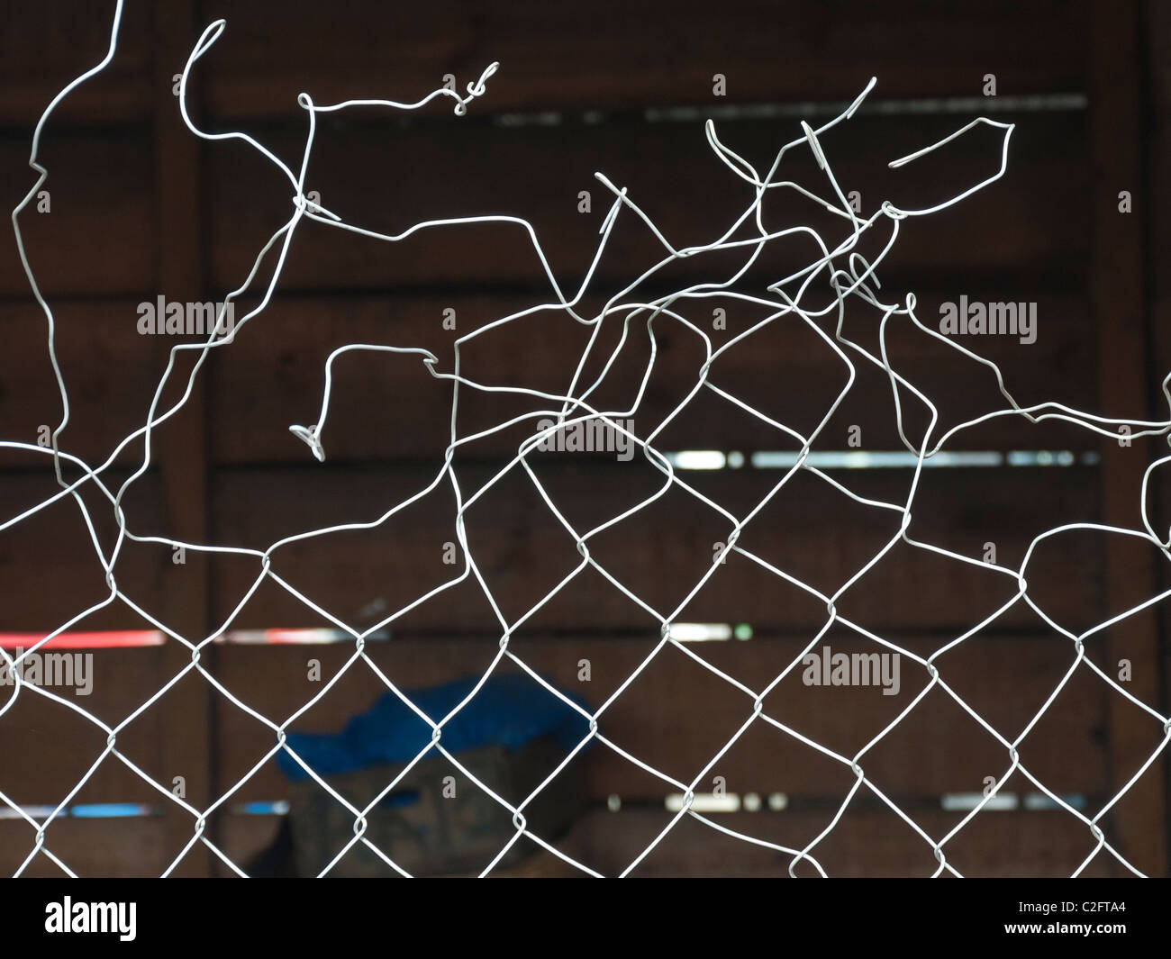Graphic pattern created by a distorted chain link fence in the public ...