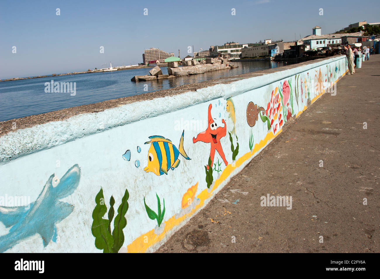A colourful wall on the waterfront in Kholmsk, Sakhalin, Russia ...