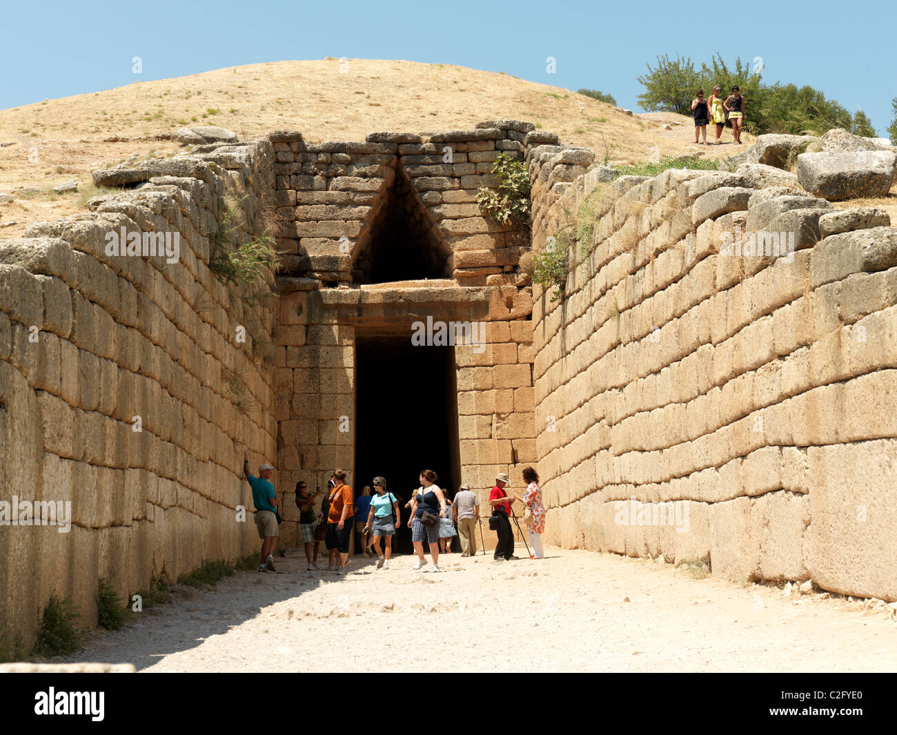 Mycenae Peloponnese Greece Tourists At The Entrance Of Tholos Tomb ...