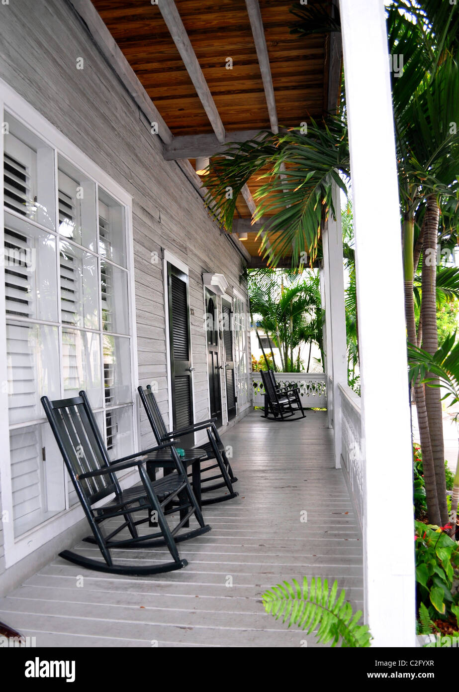 Tropical, Tranquil and Relaxing Front Porch with Rocking Chairs - Key ...
