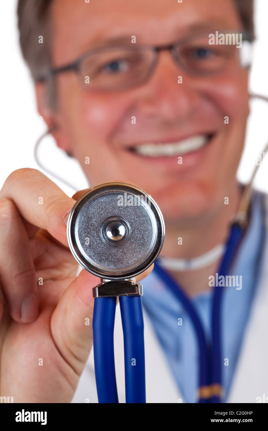 Close-up macro of stethoscope, held by smiling oder male doctor, over ...