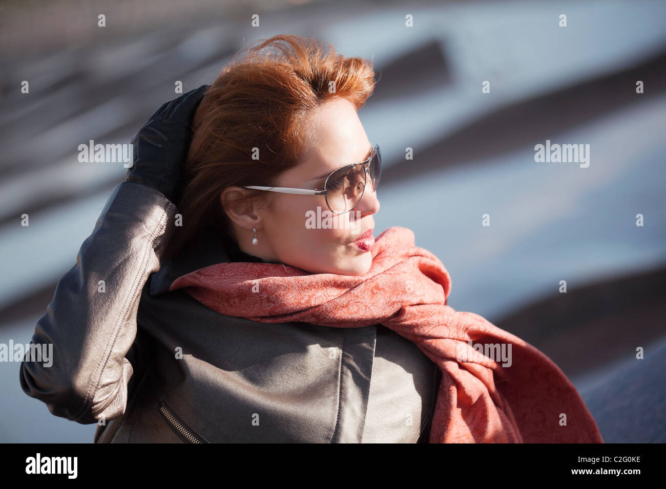 Sad girl in red scarf hi-res stock photography and images - Alamy