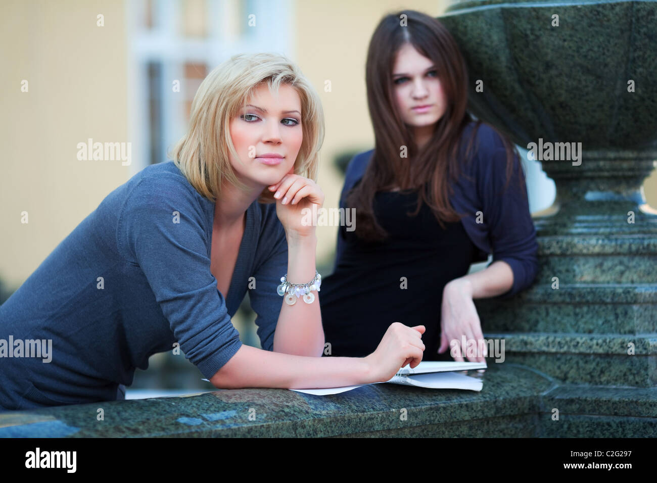 Two young female students on campus before exam Stock Photo - Alamy