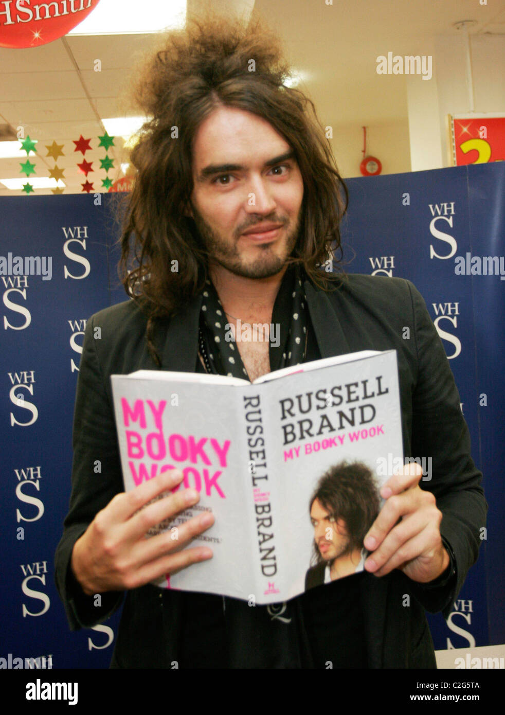 Russell Brand signs his new book, 'My Booky Wook,' at WH Smith in Leeds ...