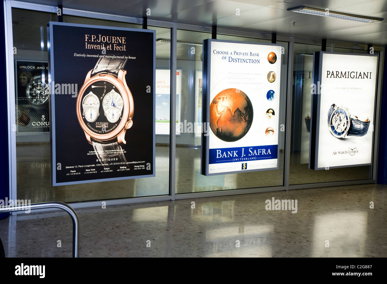 Watch & bank adverts / advert sign / poster at International terminal ...