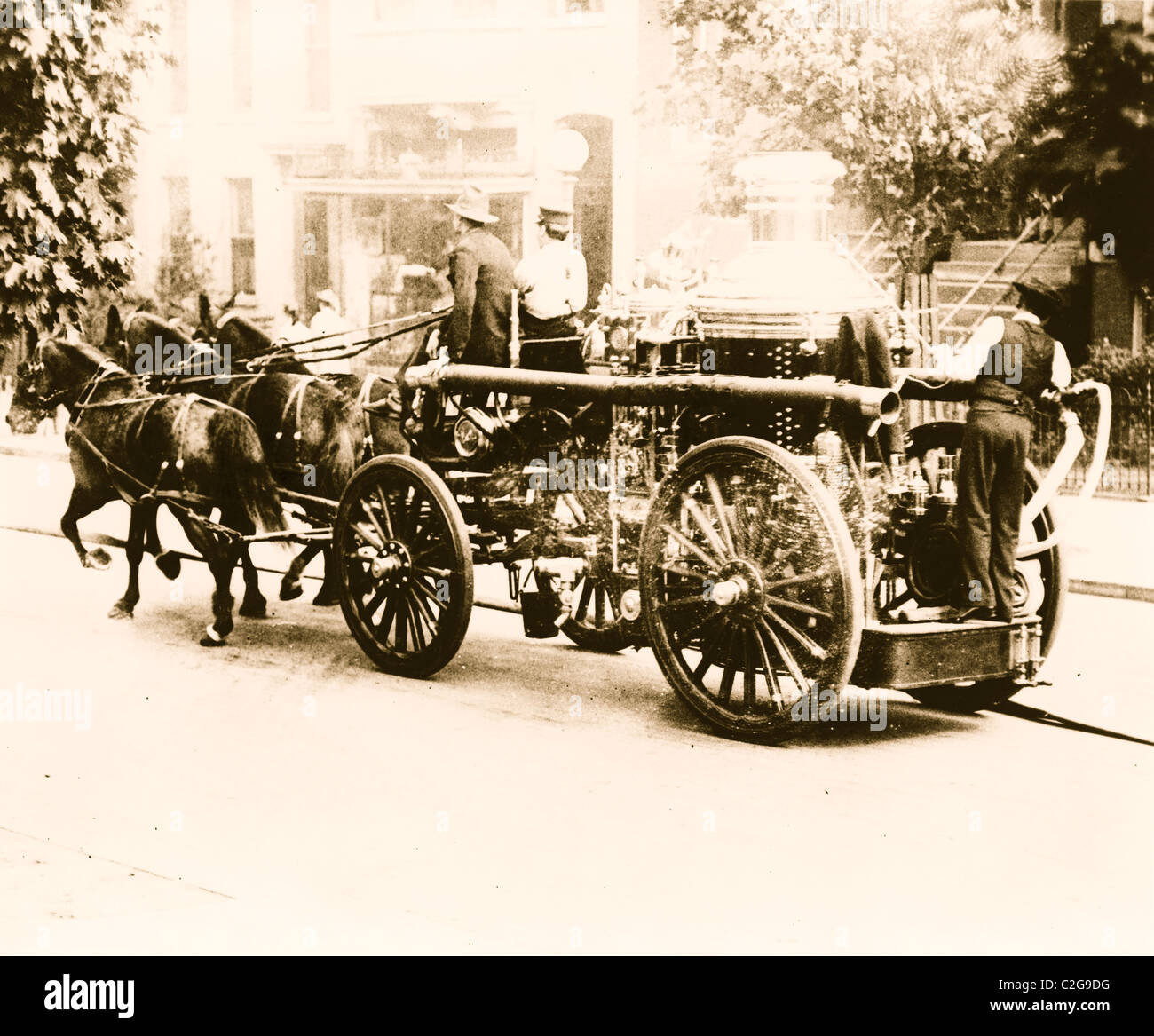 Three firemen on fire engine drawn by three horses, Washington, D.C ...