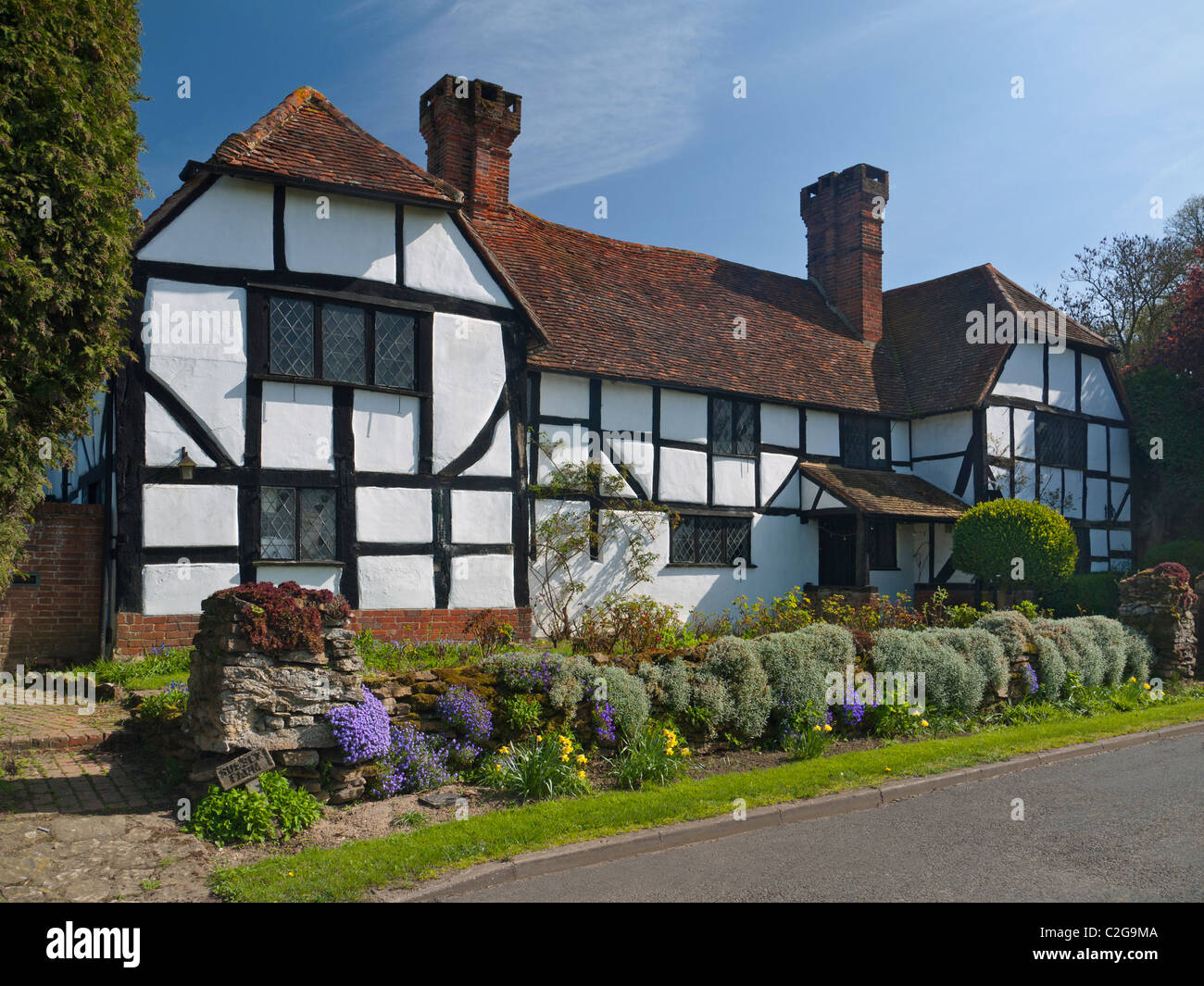 Historic traditional half timbered 'chocolate box' cottage with spring ...