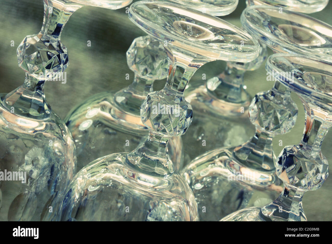 Closeup of wine glasses feet Stock Photo - Alamy