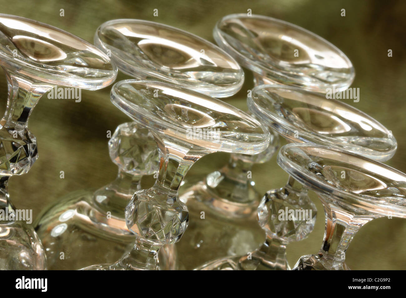 Closeup of wine glasses feet Stock Photo - Alamy