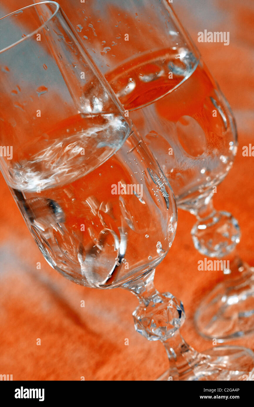 Betrothal ring falling into wine glass Stock Photo - Alamy