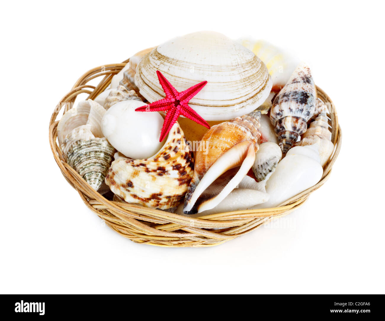 some seashells in small basket isolated on white Stock Photo - Alamy