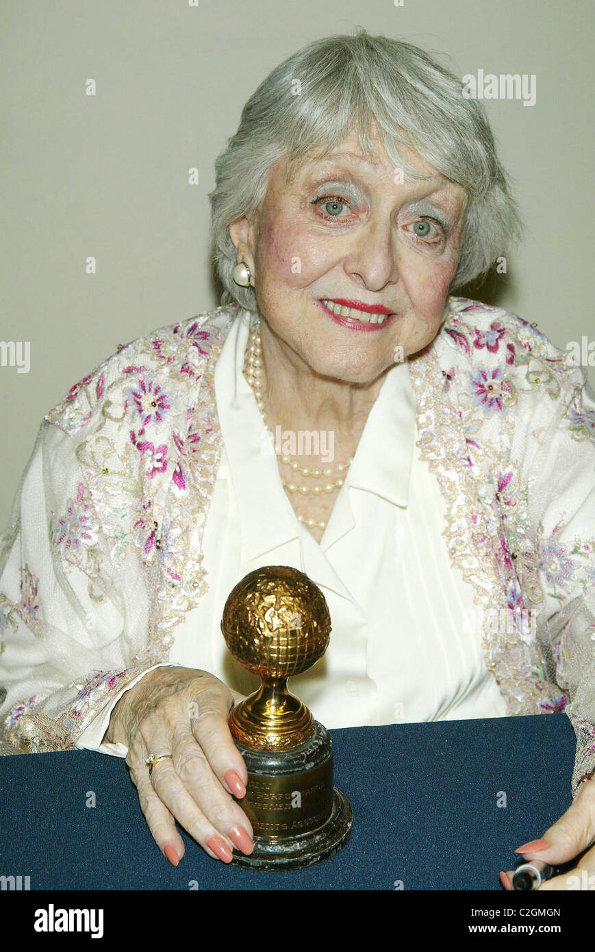 Celeste Holm holding her 1947 Genteleman's Agreement Golden Globe Award ...