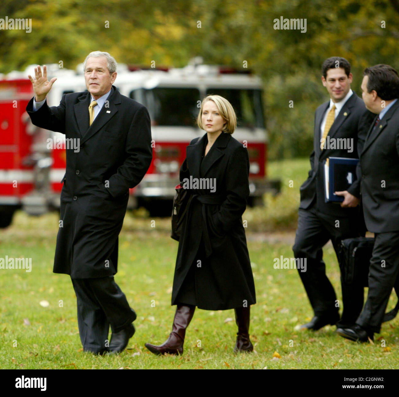 President George Bush leaving The White House with his staff after the ...