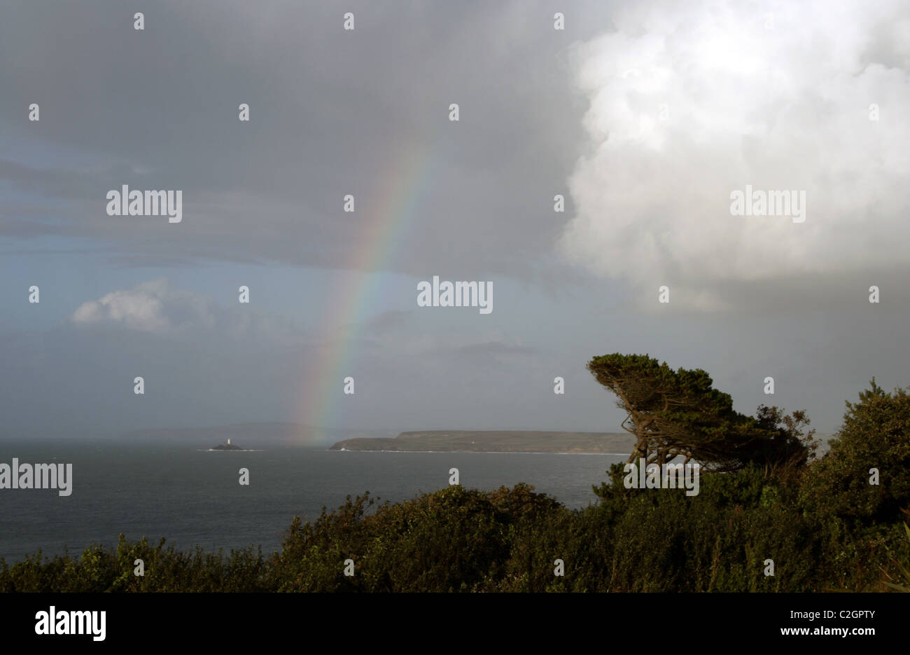 Rainbow over Godrevy Lighthouse in the bay at St Ives Stock Photo - Alamy