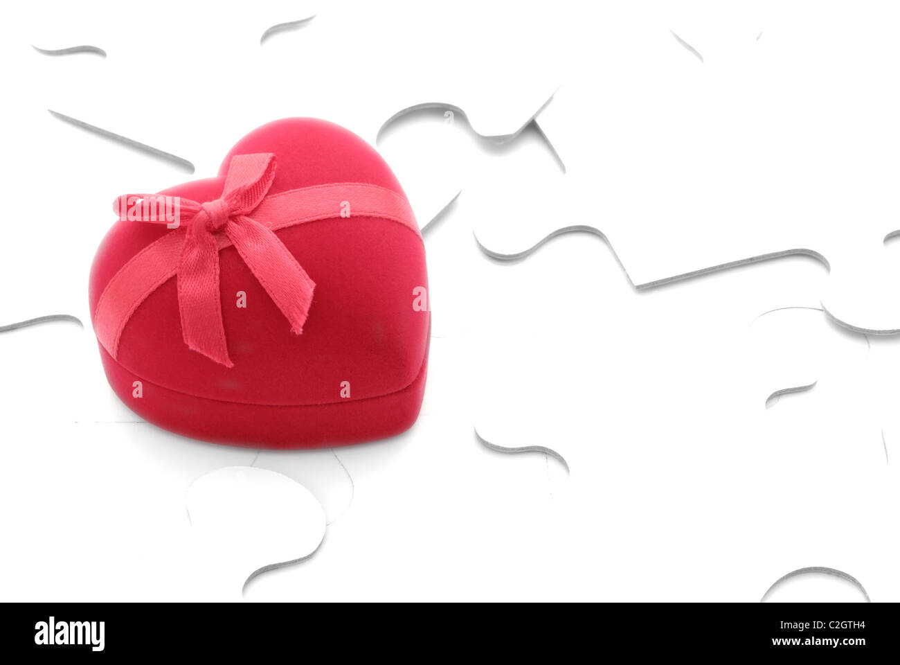 Heart on red backgrounds Cut Out Stock Images & Pictures - Alamy