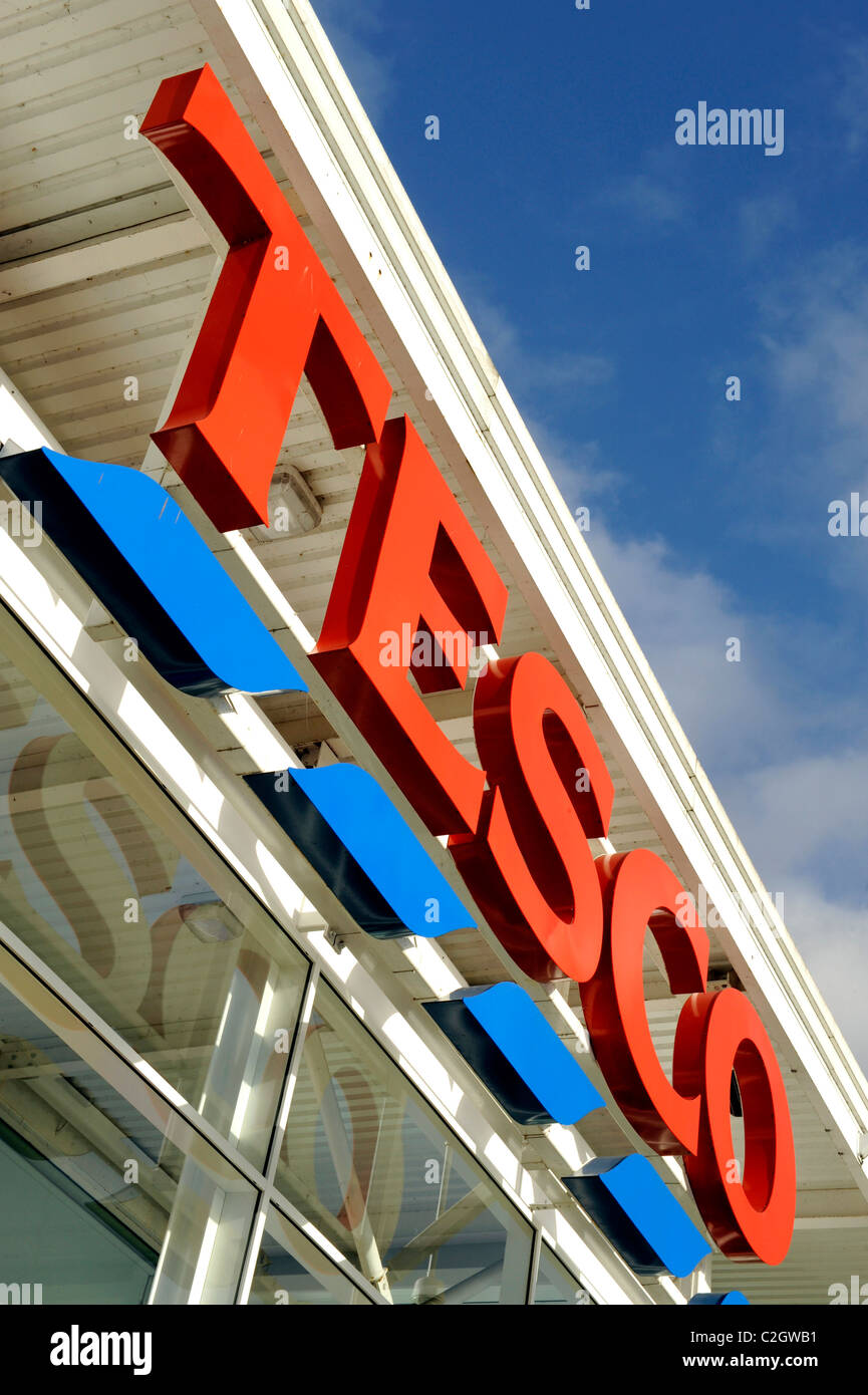 A generic Tesco supermarket sign against a blue sky Stock Photo - Alamy