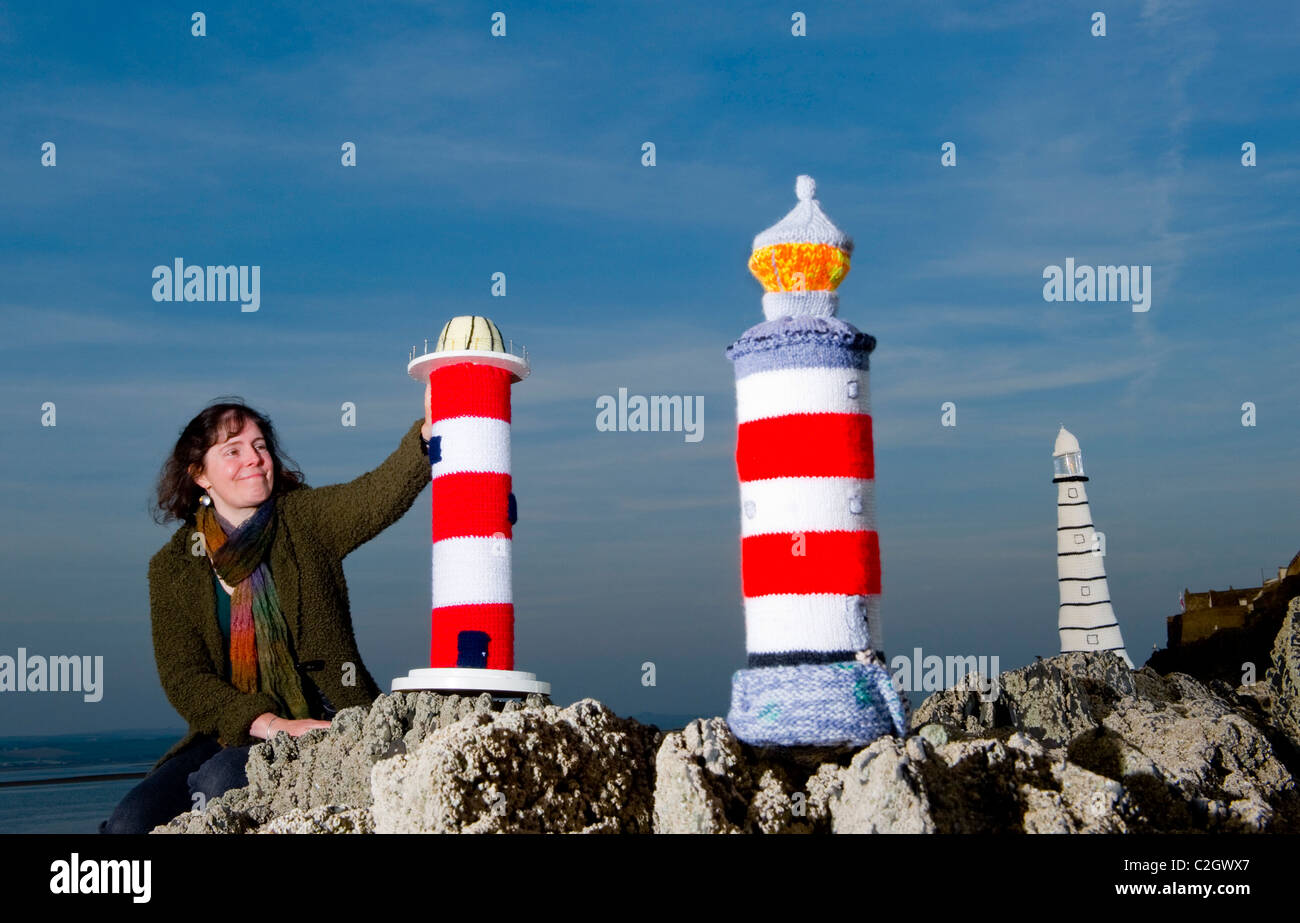 Textile artist Alison Murray with her knitted lighthouses part of ...
