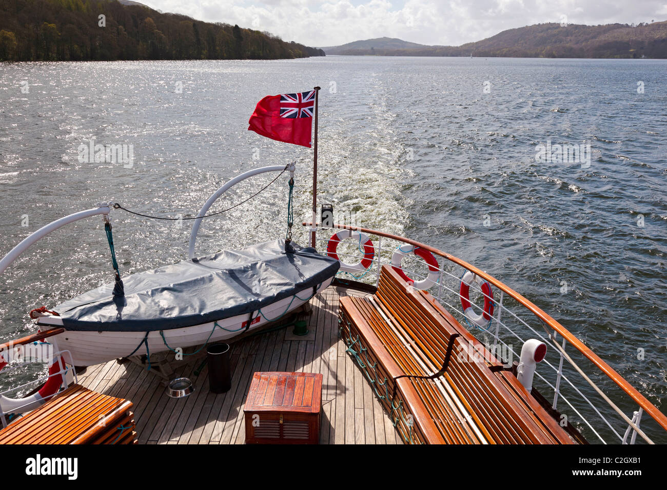 The stern of a steamer sailing on Lake Windermere with the flag the red ...