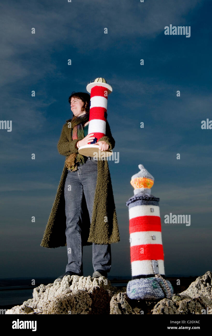 Textile artist Alison Murray with her knitted lighthouses part of ...