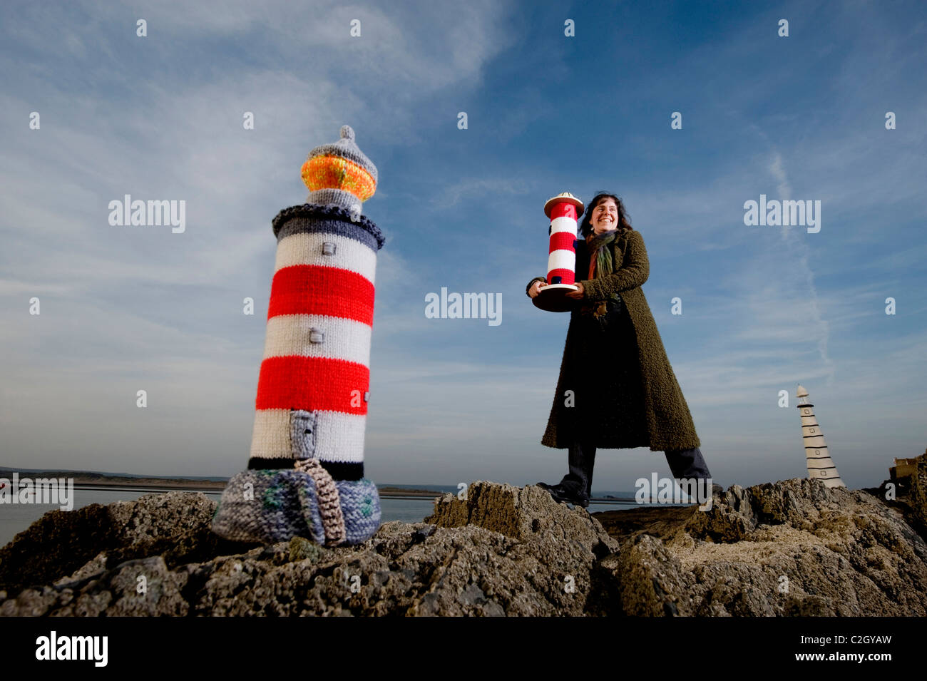 Textile artist Alison Murray with her knitted lighthouses part of ...