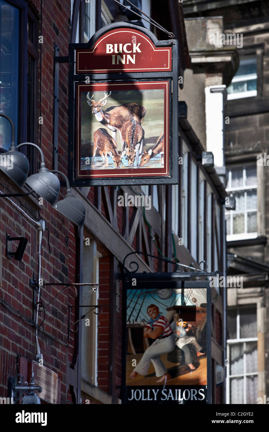 Buck Inn Pub Sign The buildings and harbour of the Old Town of Whitby ...