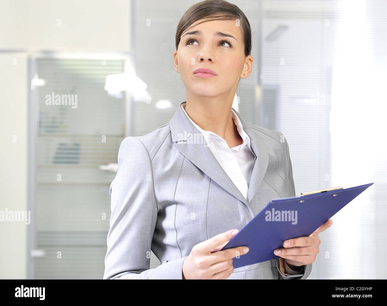 business woman holding reports inside office building. Copy space Stock ...