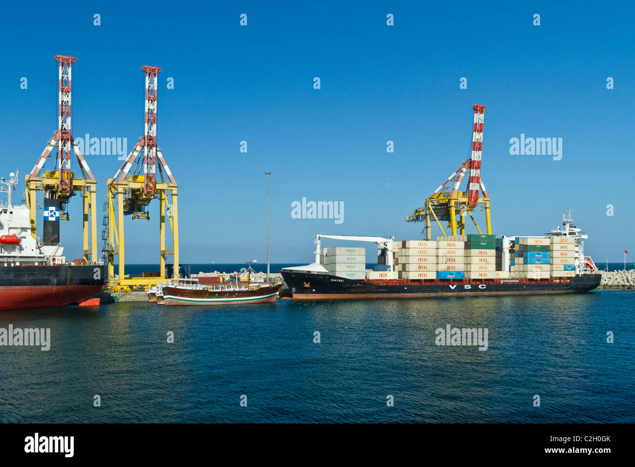 A container ship in port in the capital city of Muscat, Oman Stock ...