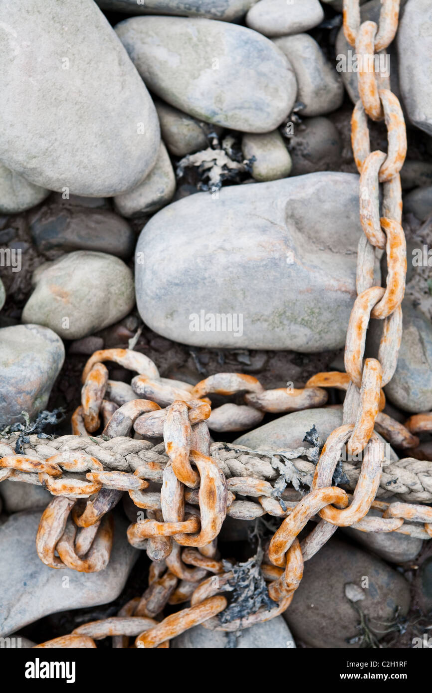 Chains on a stone beach Stock Photo - Alamy
