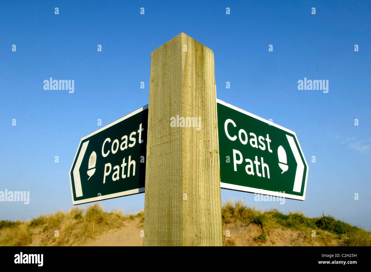 A coastal footpath sign on the South West Coast Path in North Devon, UK ...