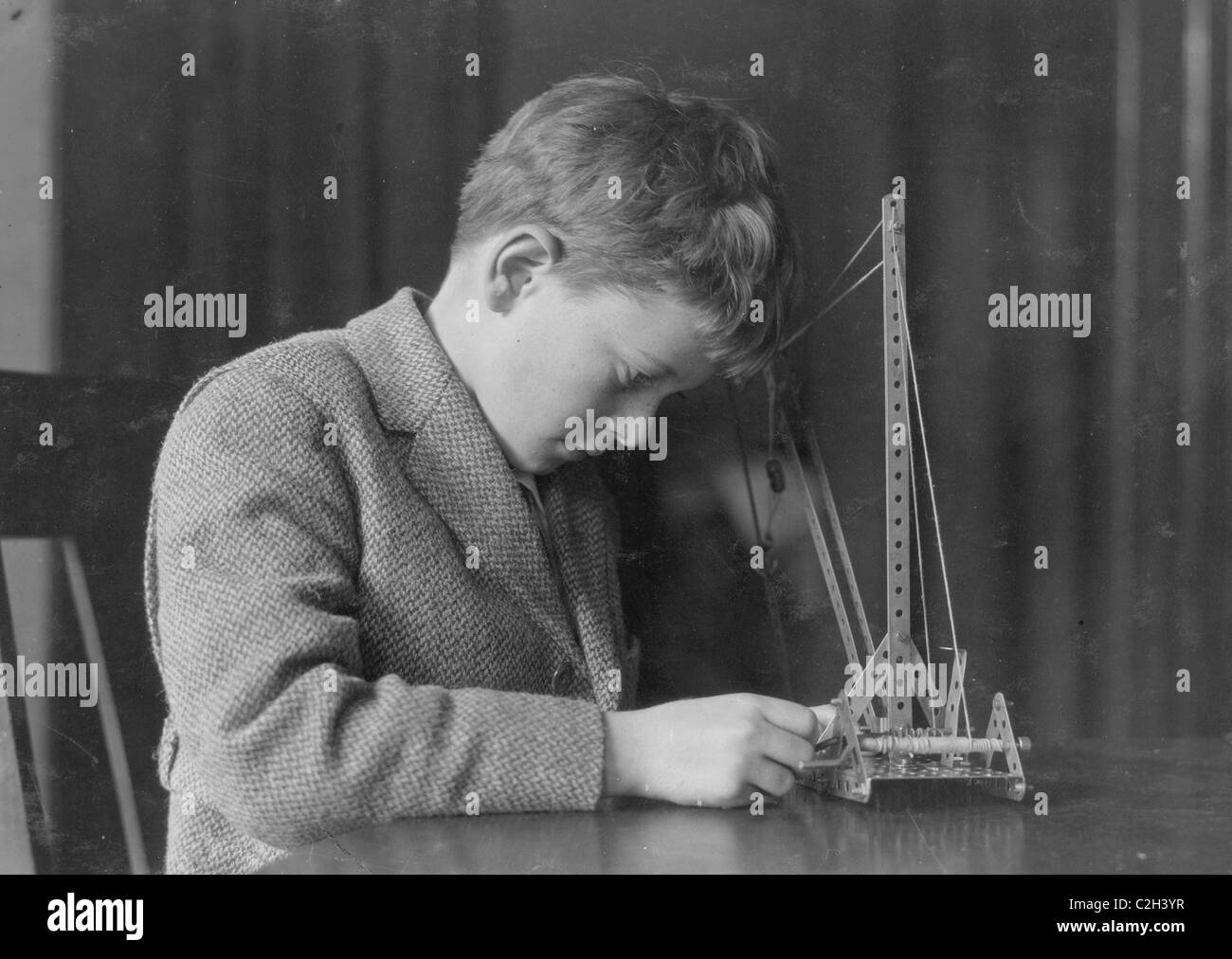 Young Boy with a Mechanical Toy Stock Photo - Alamy