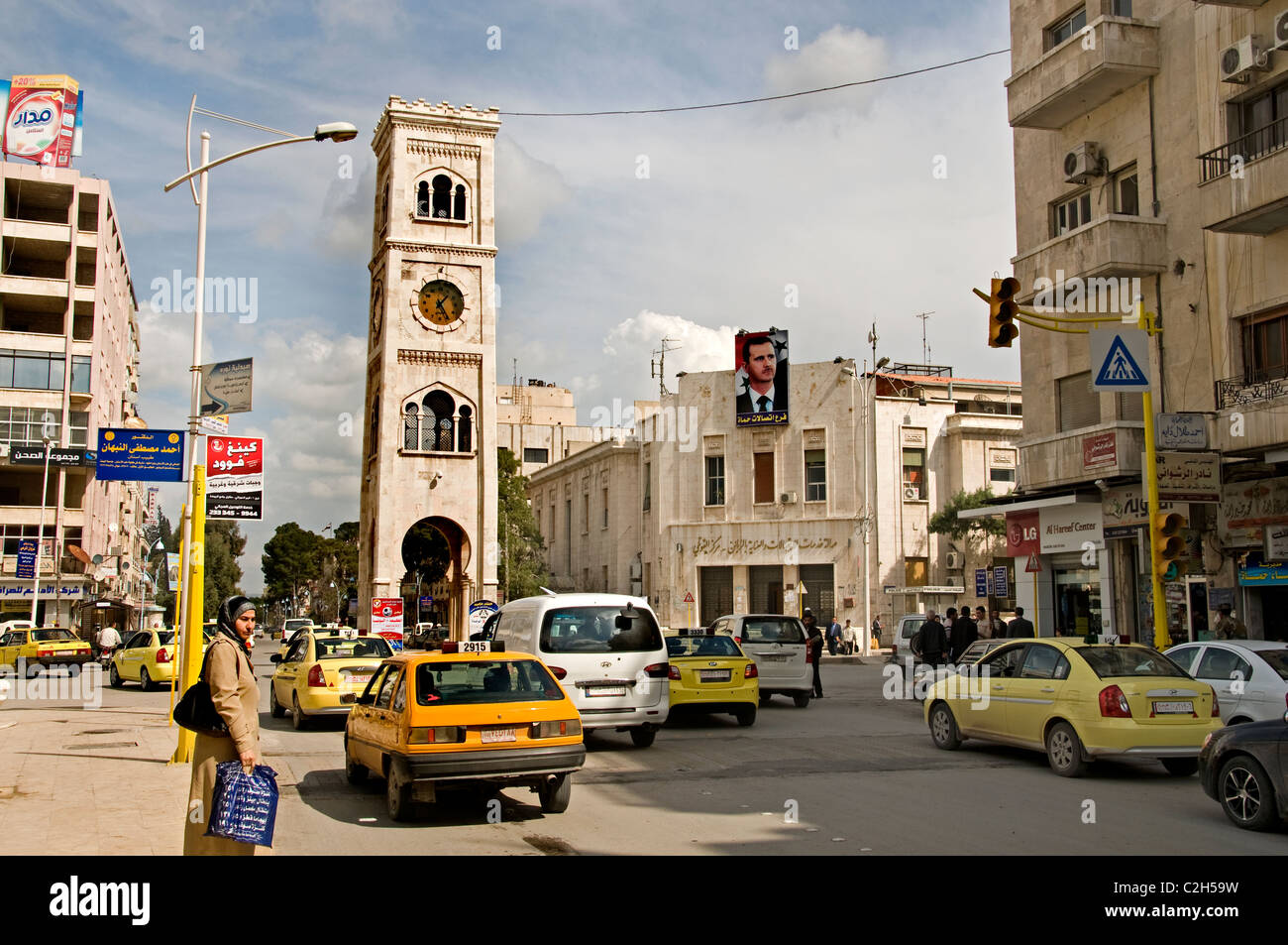 Hama Syria clock tower old city town center taxi Stock Photo - Alamy