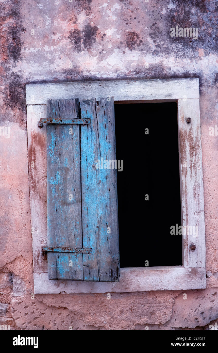 Very old blue wooden window on a village house Stock Photo - Alamy