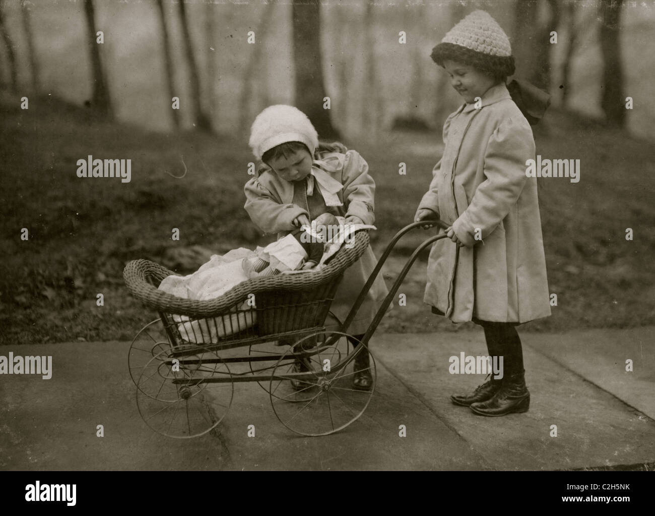 Children playing with Campbell Kid dolls Stock Photo - Alamy
