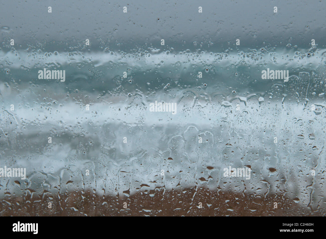 Rain storm on sea hi-res stock photography and images - Alamy