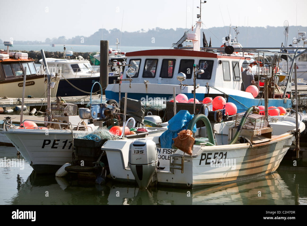 Poole Harbour Dorset. Fishing boats Stock Photo - Alamy